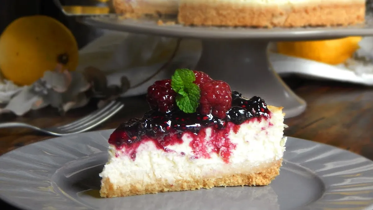 Cheesecake Clásico con reducción de Frutos Rojos - CUKit!